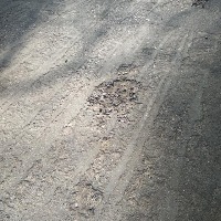 Pothole and manhole detection Instance Segmentation Dataset and Pre-Trained Model by project-auzdn